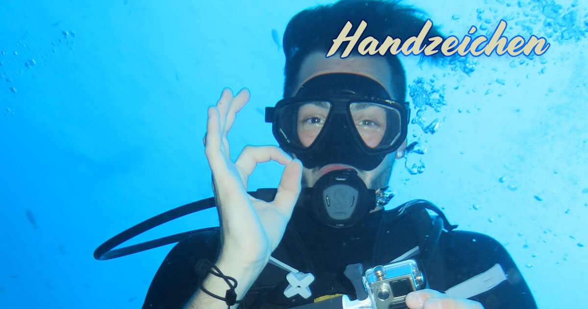 Handzeichen / Tauchzeichen beim Tauchen mit Member Diving